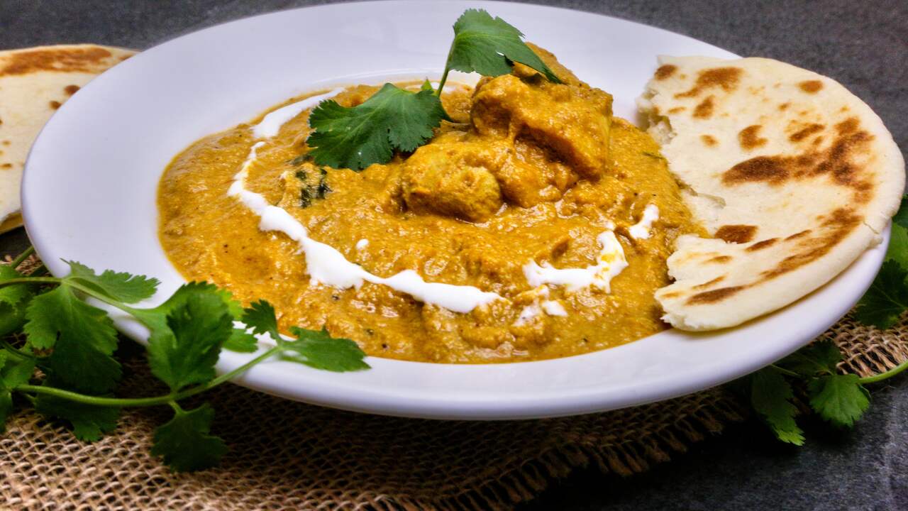 India in de ban van ruzie over wie het gerecht butter chicken heeft ...
