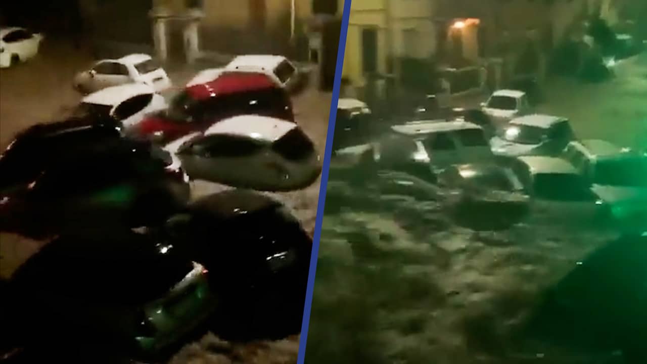 Auto's spoelen door straten in Toscane door overstromingen | NU.nl