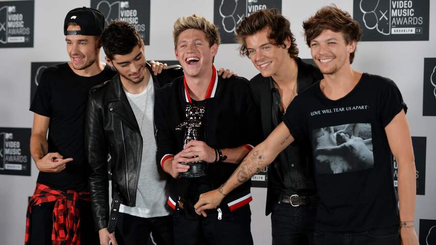 One Direction-fan (47) vol met tatoeages jongensgroep | Opmerkelijk | NU.nl