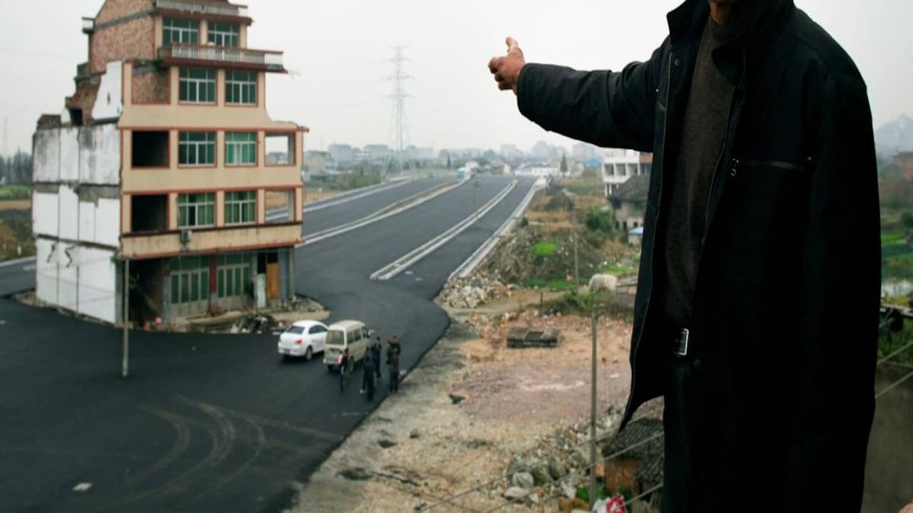 Snelweg in China om huis heen gebouwd | Overig | NU.nl
