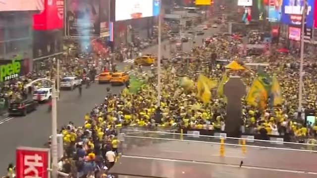 Times Square kleurt groen en geel door Braziliaanse fans | NU.nl