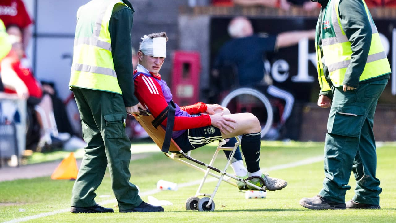 Aberdeen-speler MacKenzie verwond door eigen fan die met stoeltje gooit ...